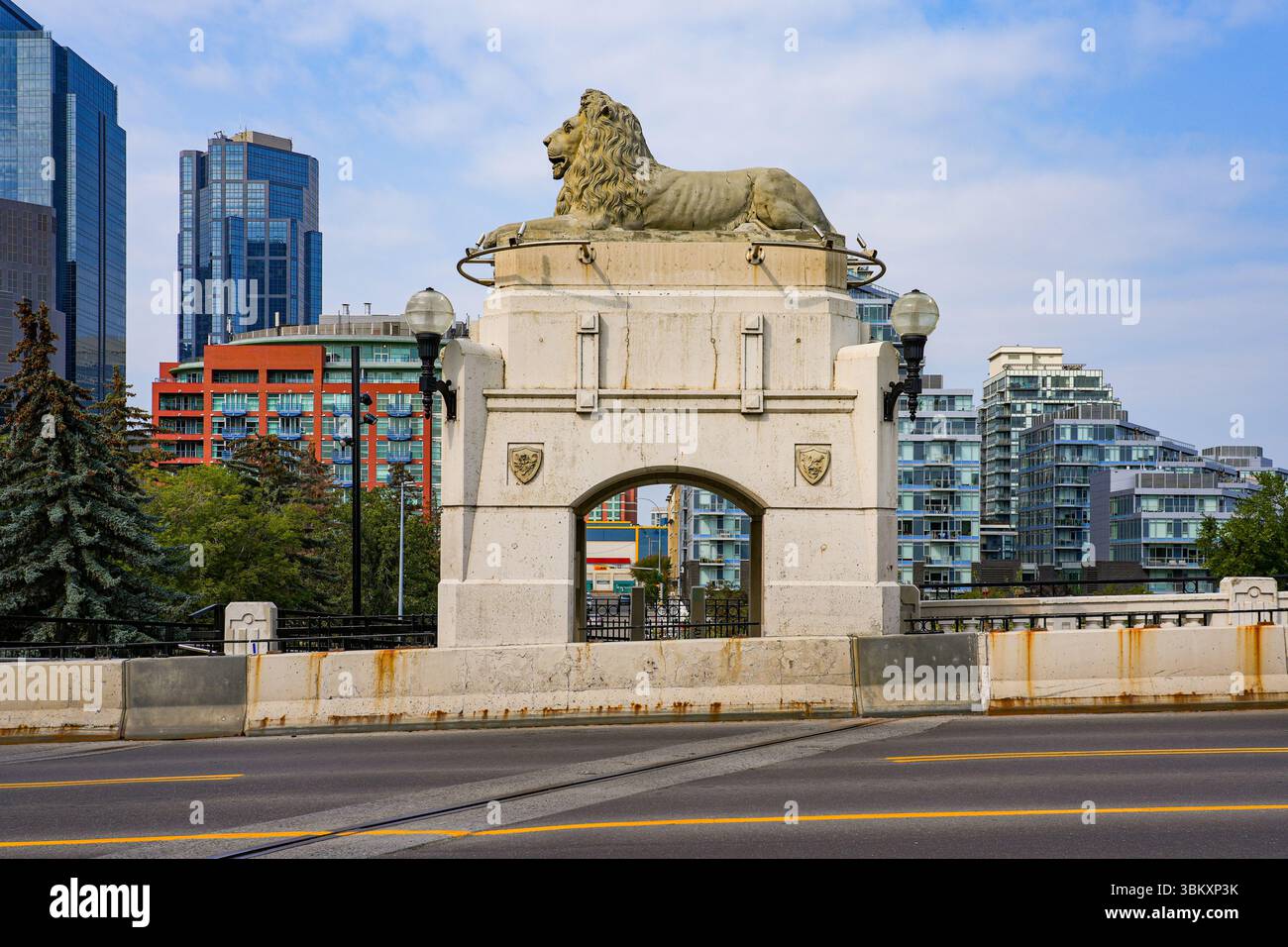 Cast concrete lion on a pavilion of the Centre Street Bridge crossing ...