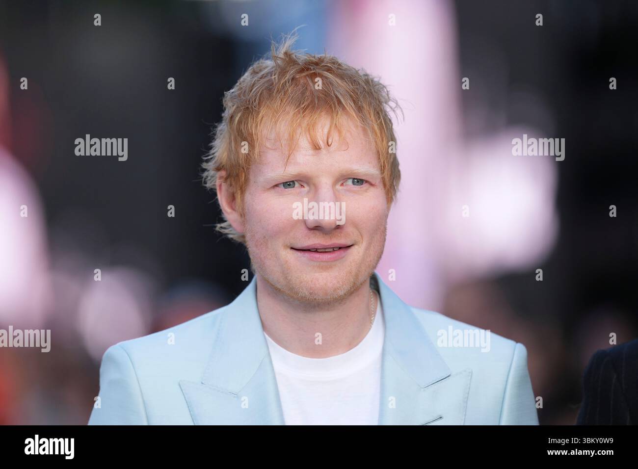 Ed Sheeran poses for photographers upon arrival at the premiere of the ...