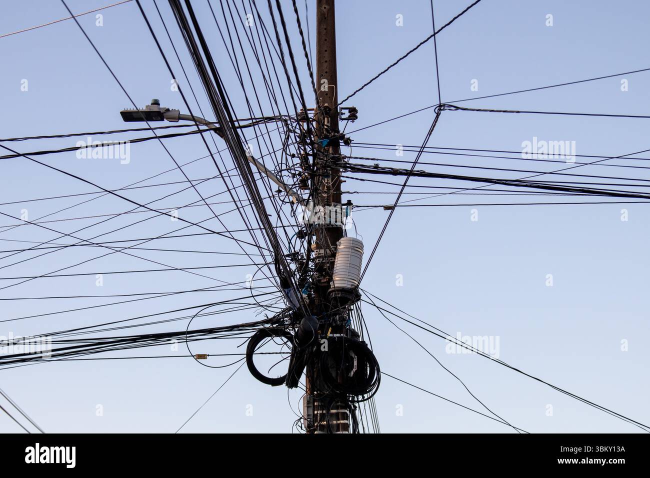 Tangled utility pole cables hi-res stock photography and images - Alamy
