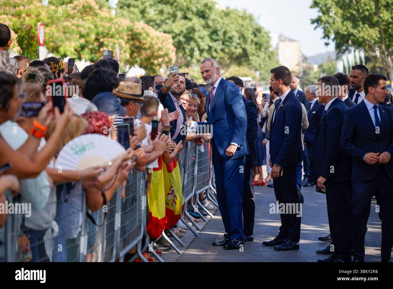 King Felipe VI greets residents during a visit to Badia de Vallès, June 23, 2025, in Badia de ...