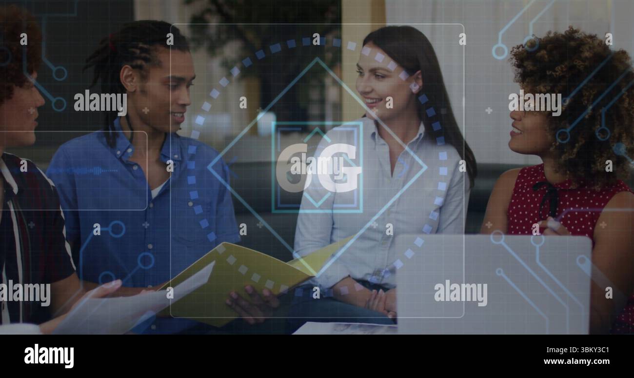 Reviewing documents on laptop, project team members collaborating in office lounge, with 6G ...