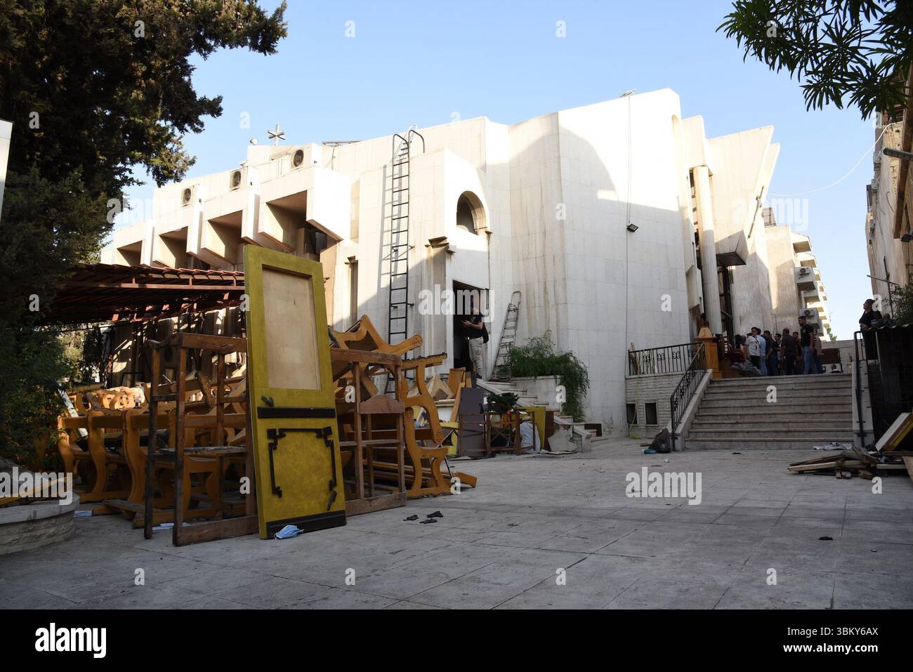 Damascus, Syria. 23rd June, 2025. People attend a memorial ceremony at ...
