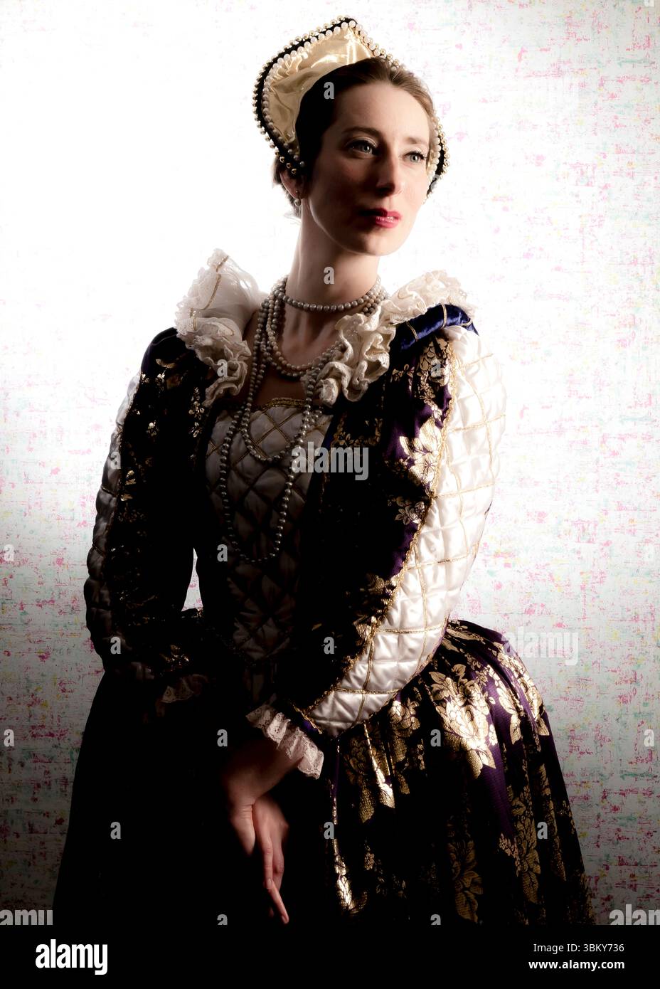 A woman in a historical costume, possibly from the Renaissance period ...
