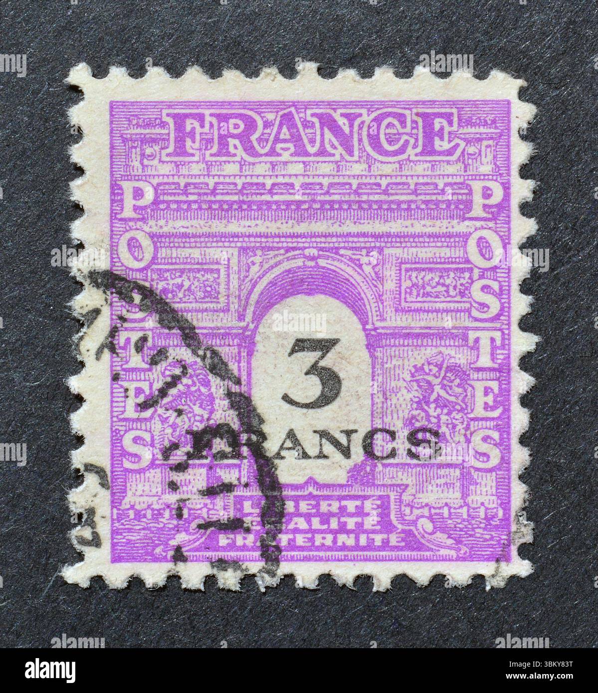 Cancelled postage stamp printed by France, that shows Arc de Triomphe ...