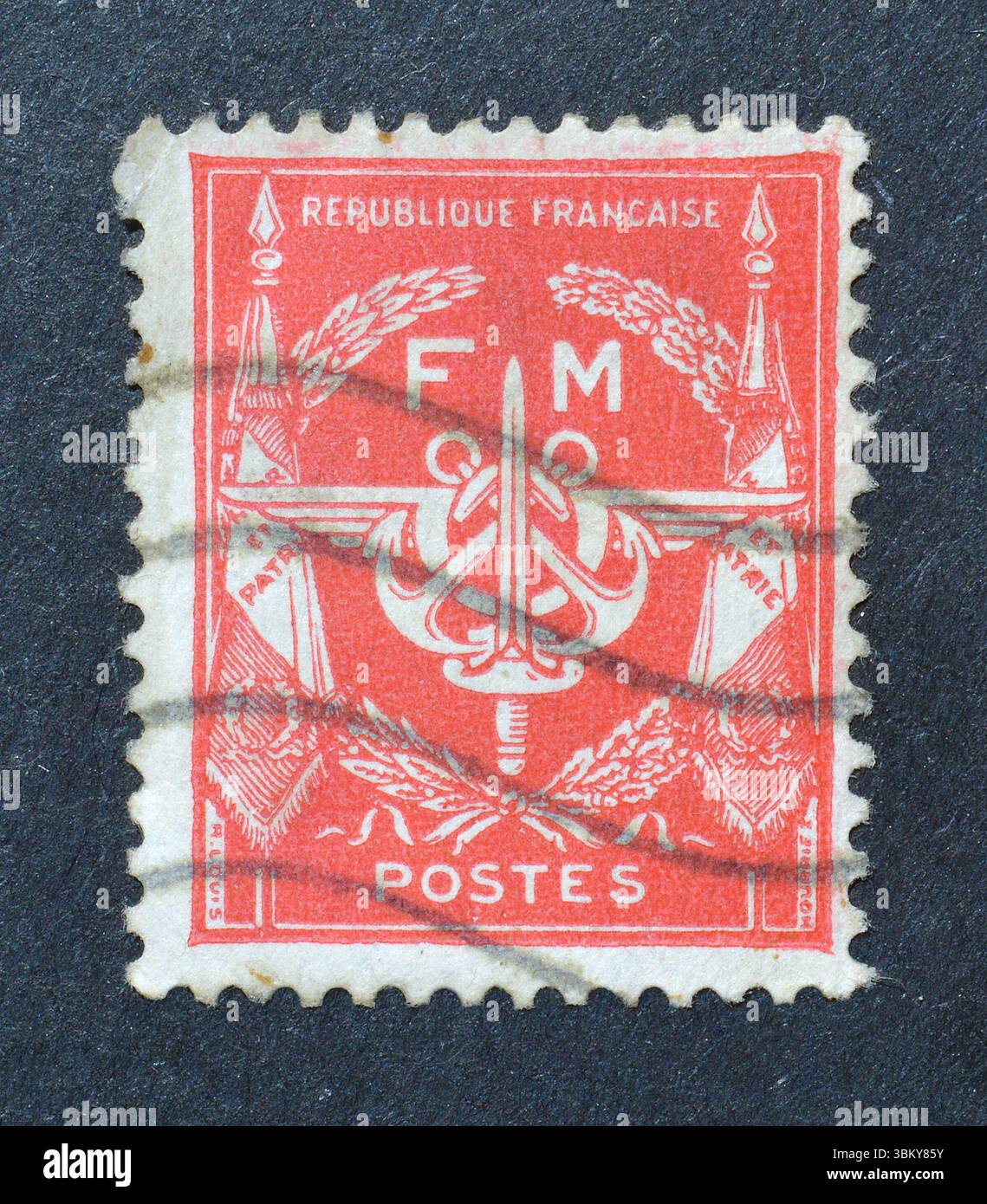 Cancelled postage stamp printed by France, that shows The three weapons ...