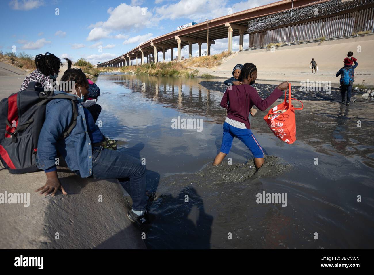 Group wading through river hi-res stock photography and images - Alamy