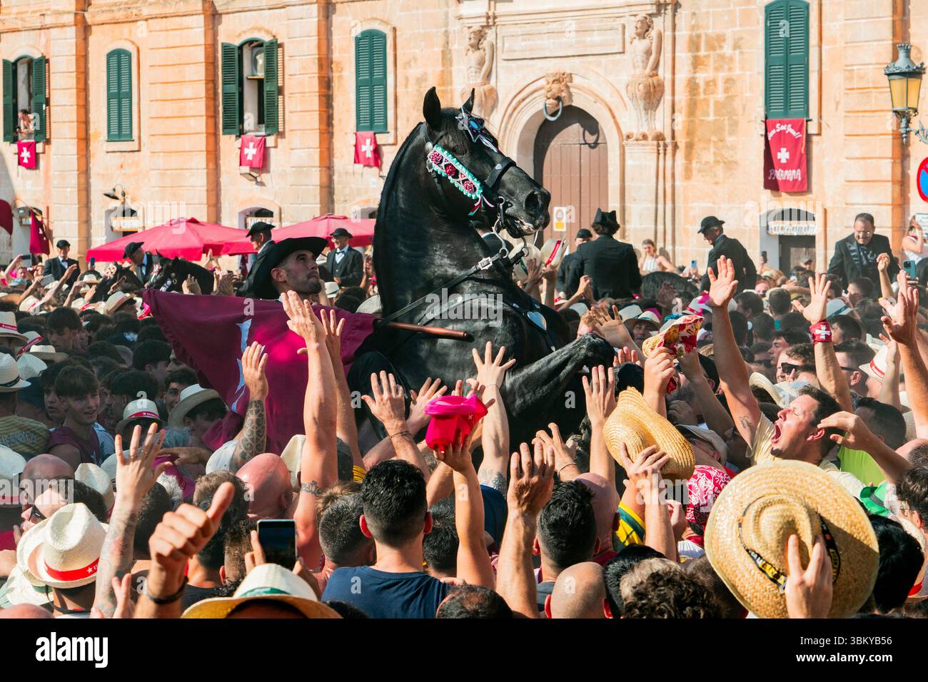 Dozens of people during the Caragol des Born at the Plaça Es Born in ...