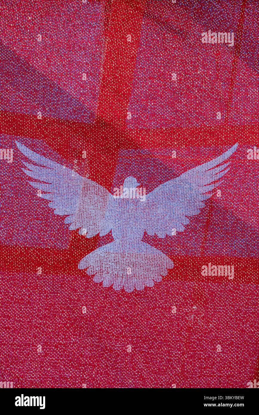 Symbol of the Holy Spirit, red with a white dove, adorns the streets ...