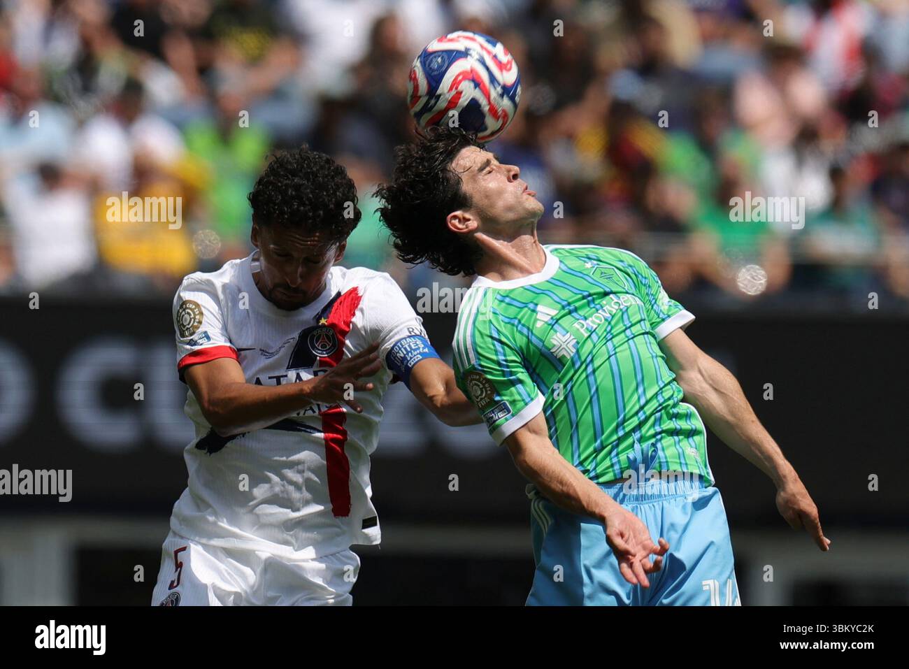 Paris Saint-Germain's Marquinhos, left, and Seattle Sounders' Paul ...