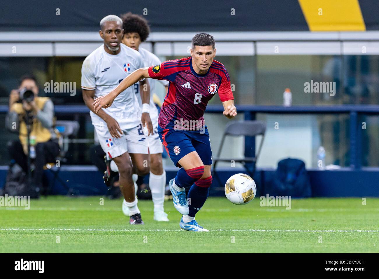 ARLINGTON, TX - JUNE 18: Costa Rica defender Joseph Mora (#8) dribbles ...