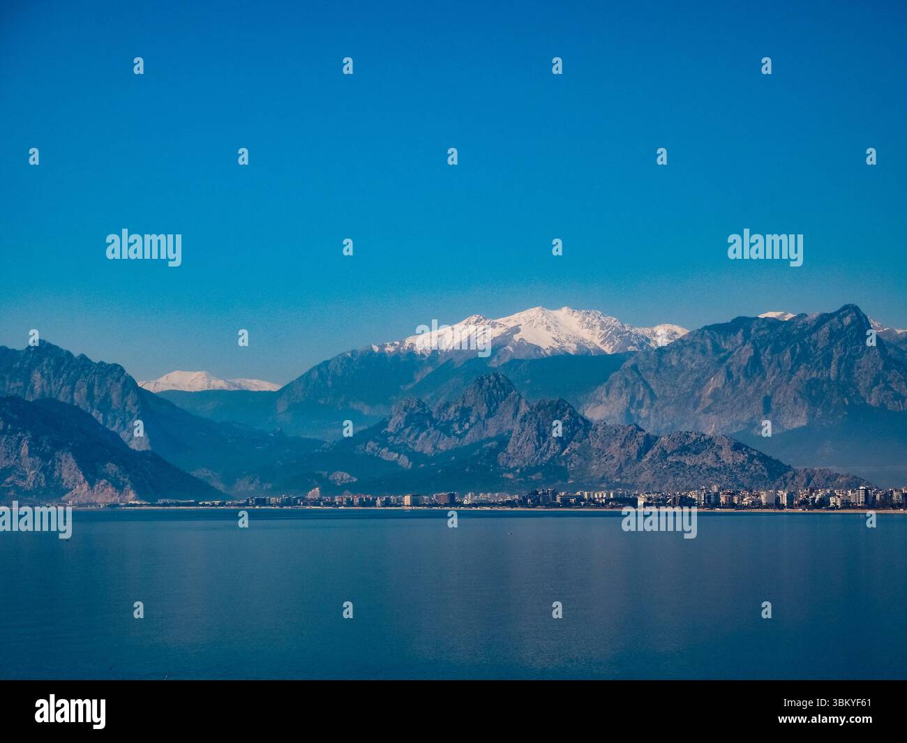 A scenic view of Antalya, Turkey, showcasing the city's coastal skyline ...