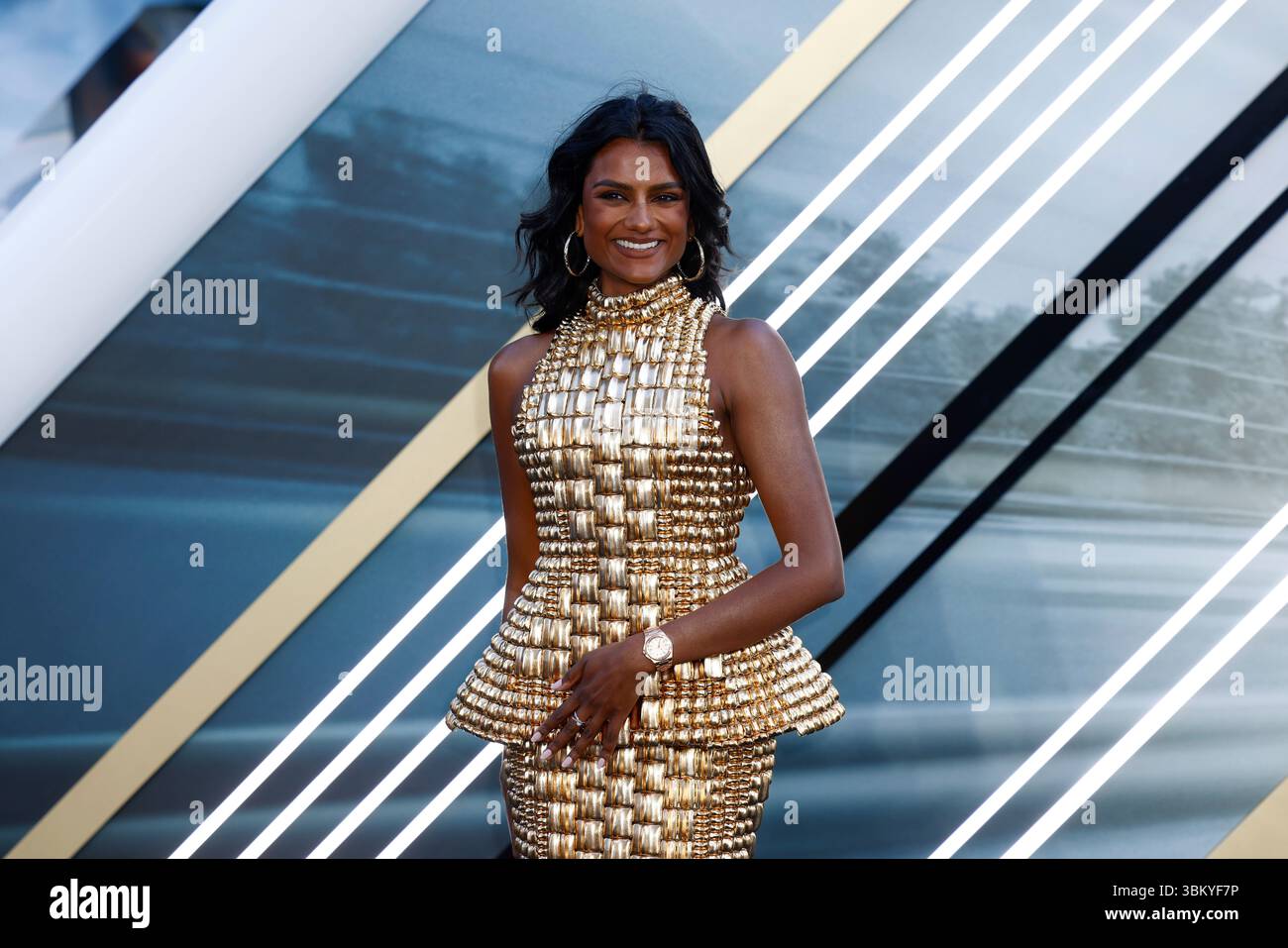 Simone Ashley poses for photographers upon arrival at the premiere of ...