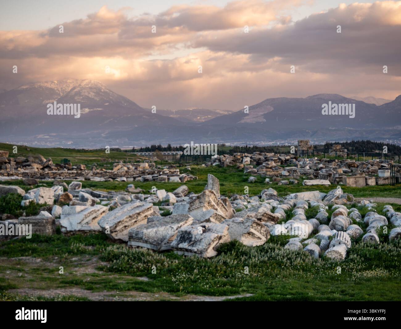 The image shows the ruins of Hierapolis, an ancient city located near ...