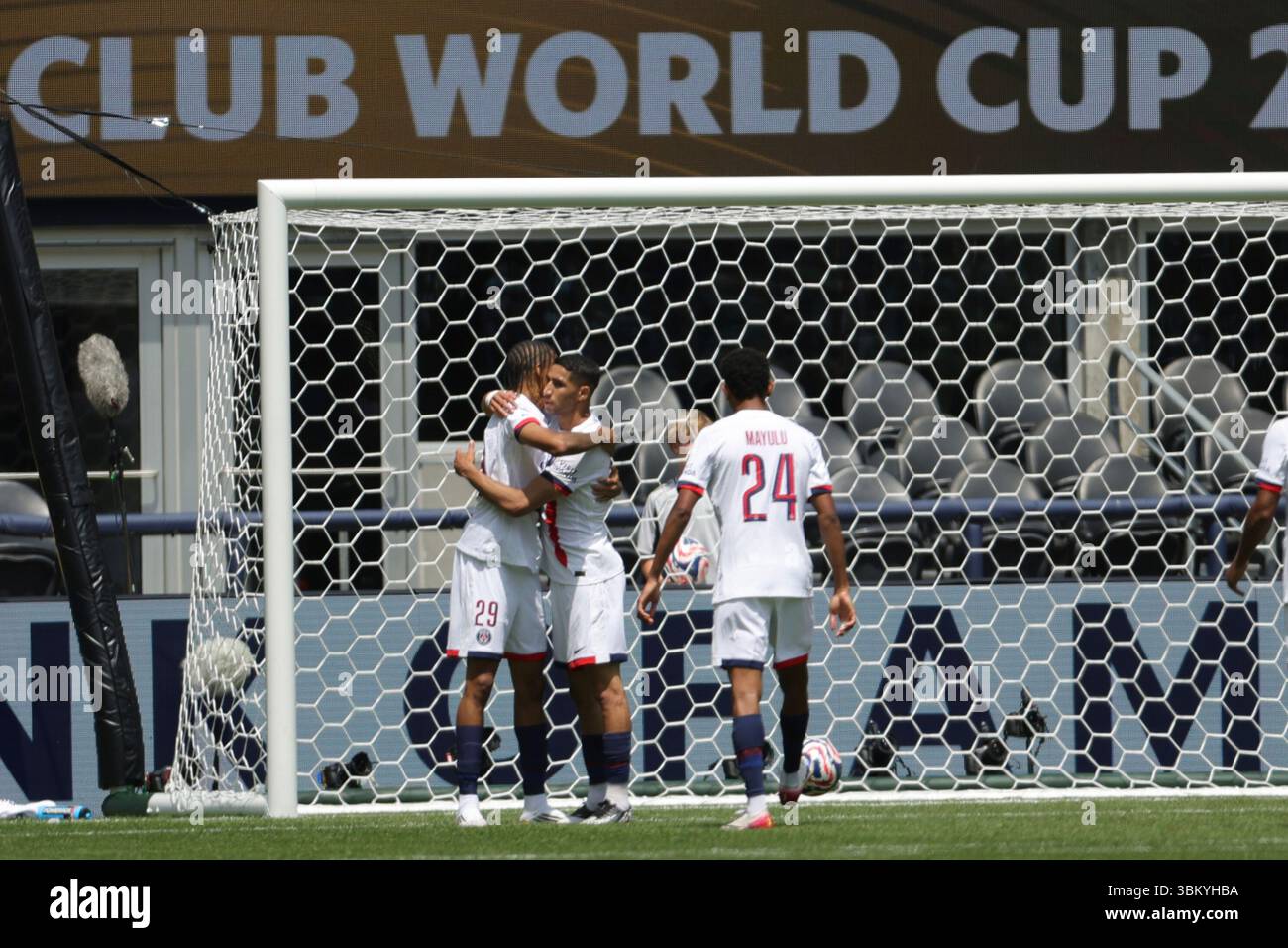 Paris Saint-Germain's Achraf Hakimi, center, celebrates after scoring ...