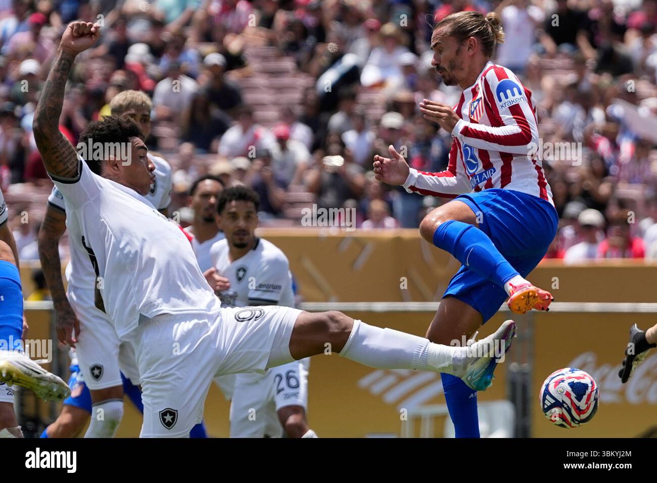 Atletico Madrid's Antoine Griezmann, right, and Botafogo's Igor Jesus ...