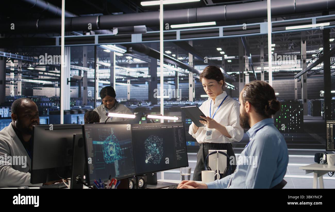 Data center team leader supervising system operations supporting neural networks and analytics ...