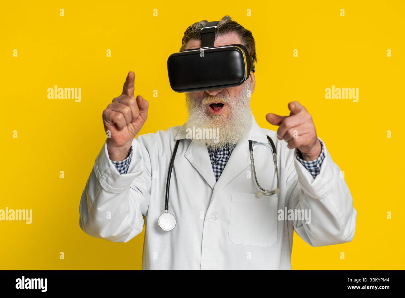 Mature cardiologist using virtual hi-res stock photography and images ...