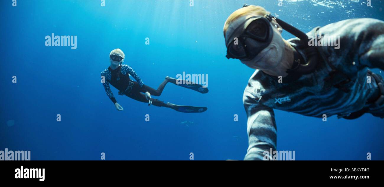 SHARK WHISPERER, from left: Ocean Ramsey, Juan Oliphant, 2025 ...