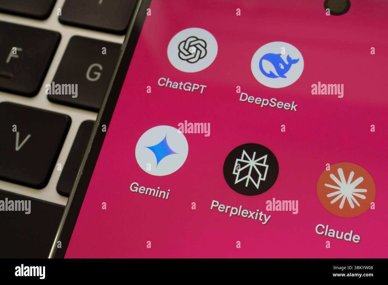 ChatGPT, Gemini, Perplexity, Claude, and DeepSeek AI apps shown on smartphone over computer ...