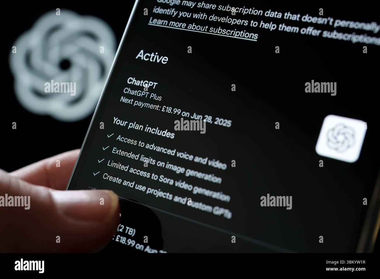 ChatGPT Plus subscription screen on smartphone displaying plan benefits ...