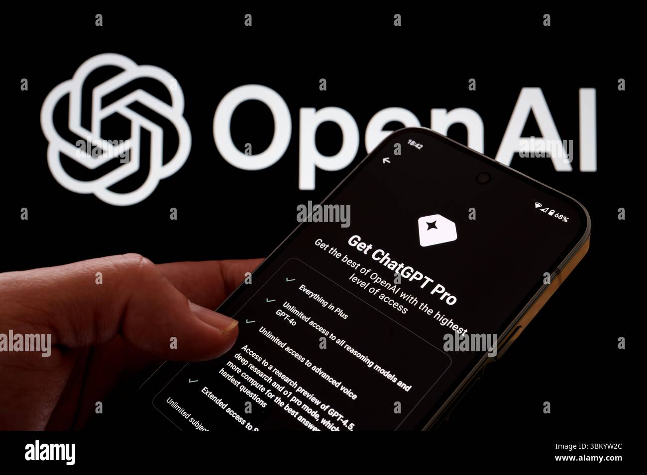 ChatGPT Pro subscription upgrade screen on smartphone held in hand with ...