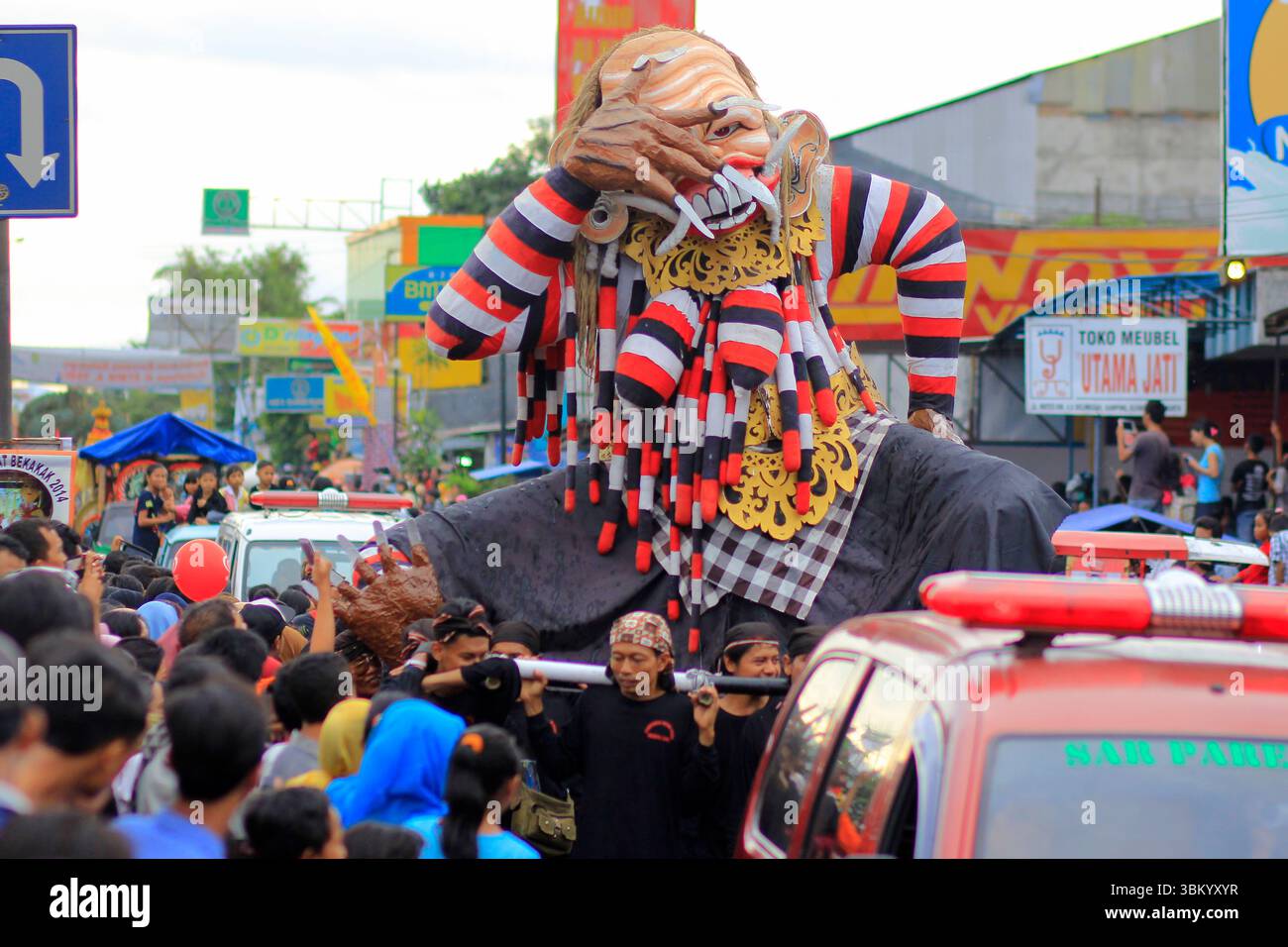 Residents paraded giant stuffed devils as a symbol of evil that often ...
