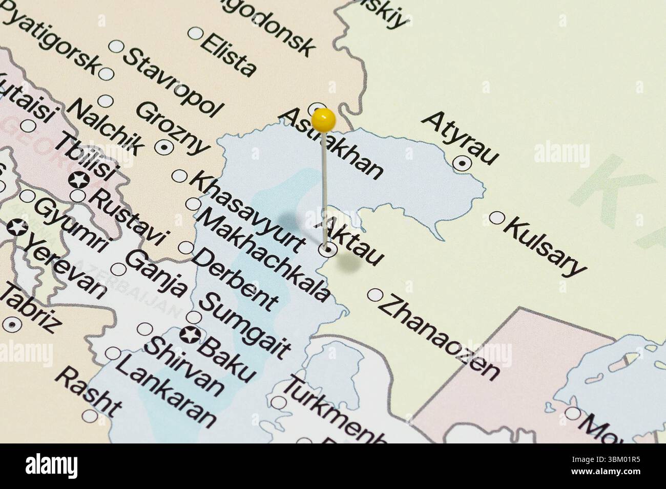 macro photo of a yellow pin needle into Aktau city of Kazakhstan ...