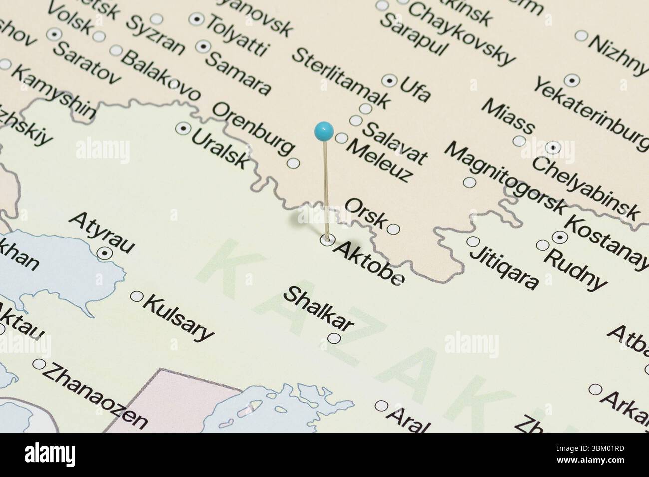 macro photo of a light blue pin needle into Aktobe city of Kazakhstan ...