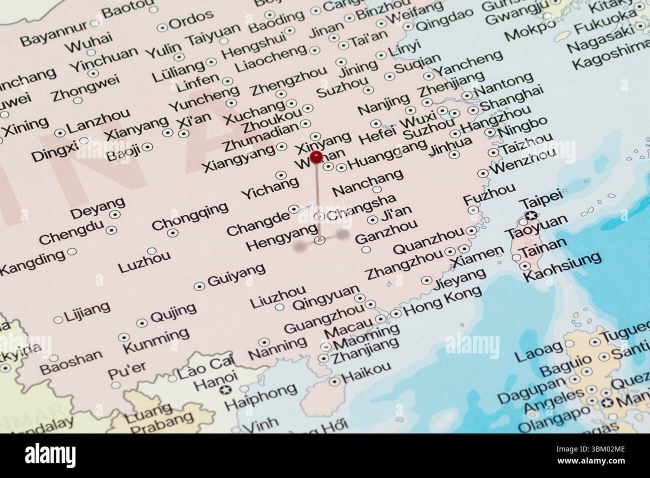 macro photo of a red pin needle into Hengyang city of China political ...