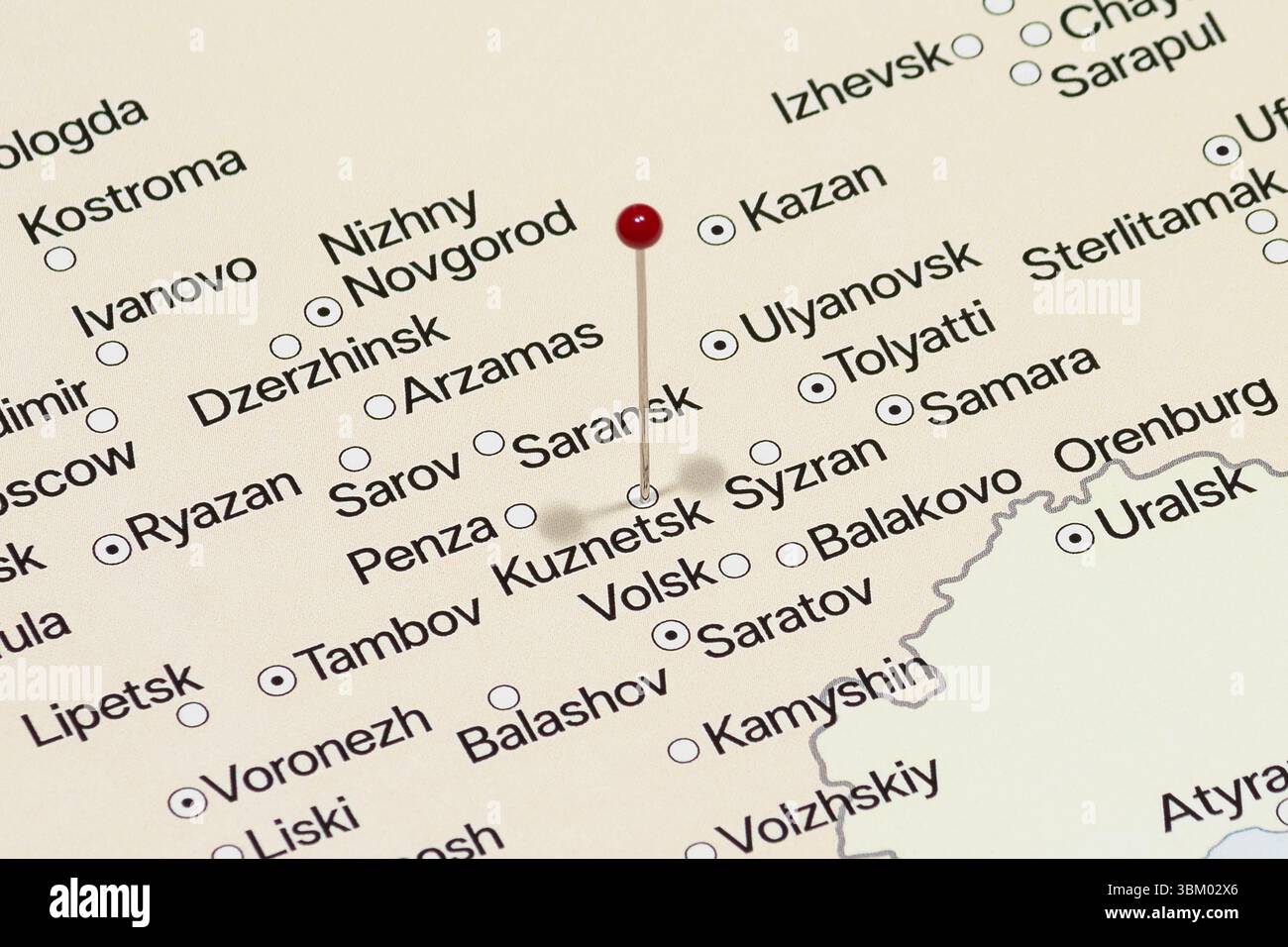 macro photo of a red pin needle into Kuznetsk city of Russia political ...