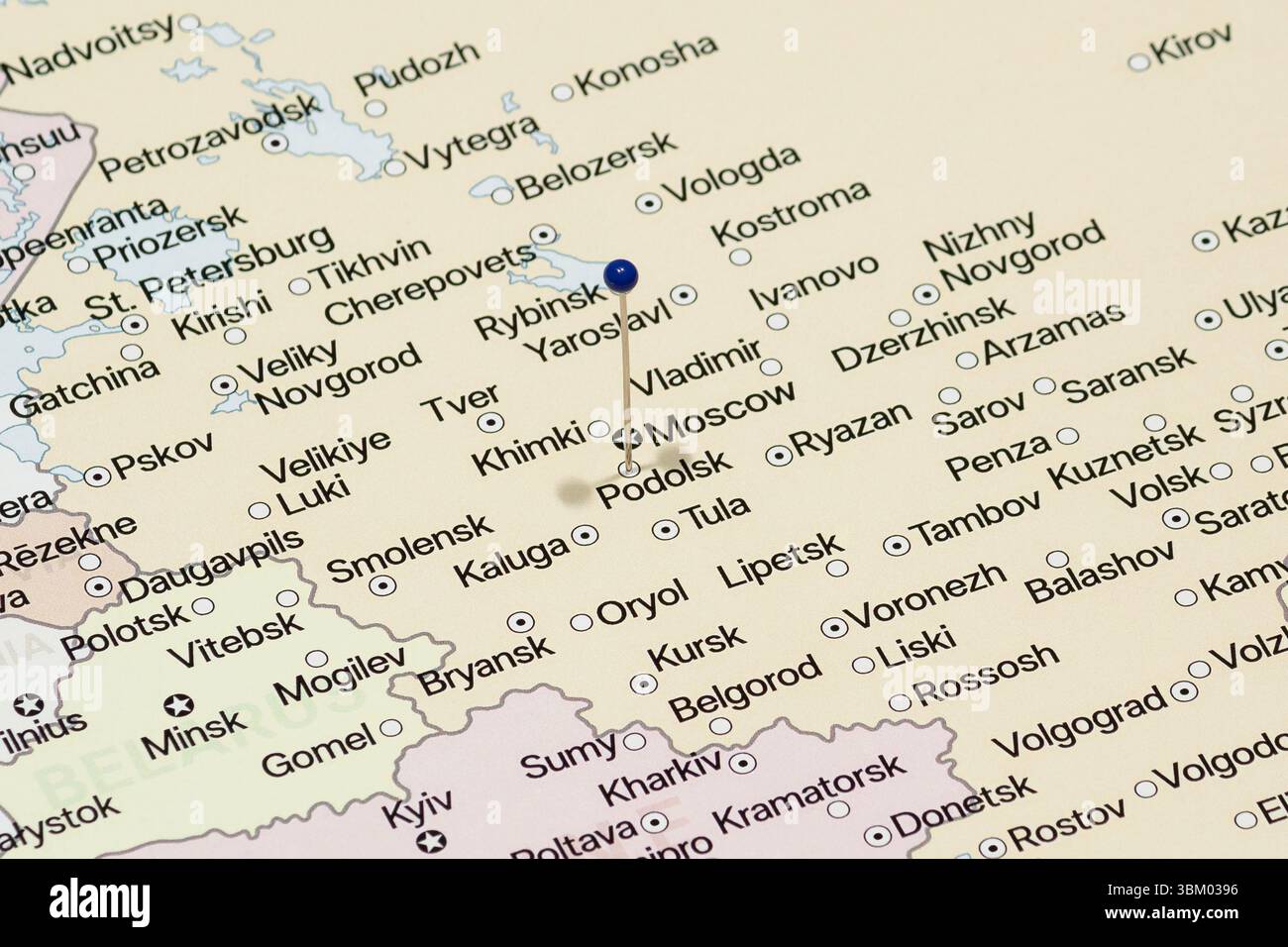 macro photo of a blue pin needle into Podolsk city of Russia political ...