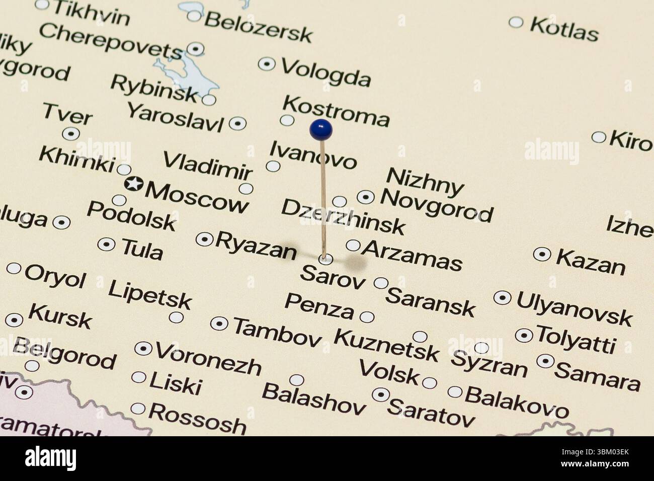 macro photo of a blue pin needle into Sarov city of Russia political ...