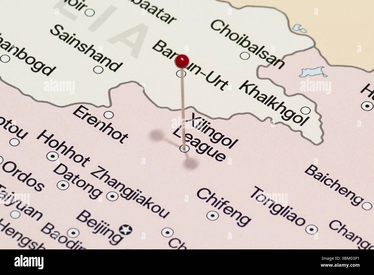 macro photo of a red pin needle into Xilingol League city of China ...