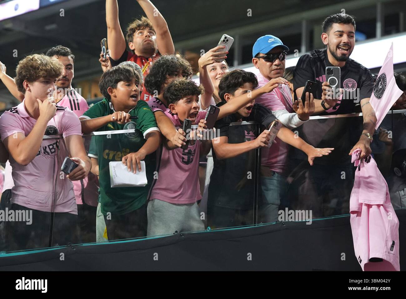 Inter Miami fans cheer as the team runs into the stadium before the ...