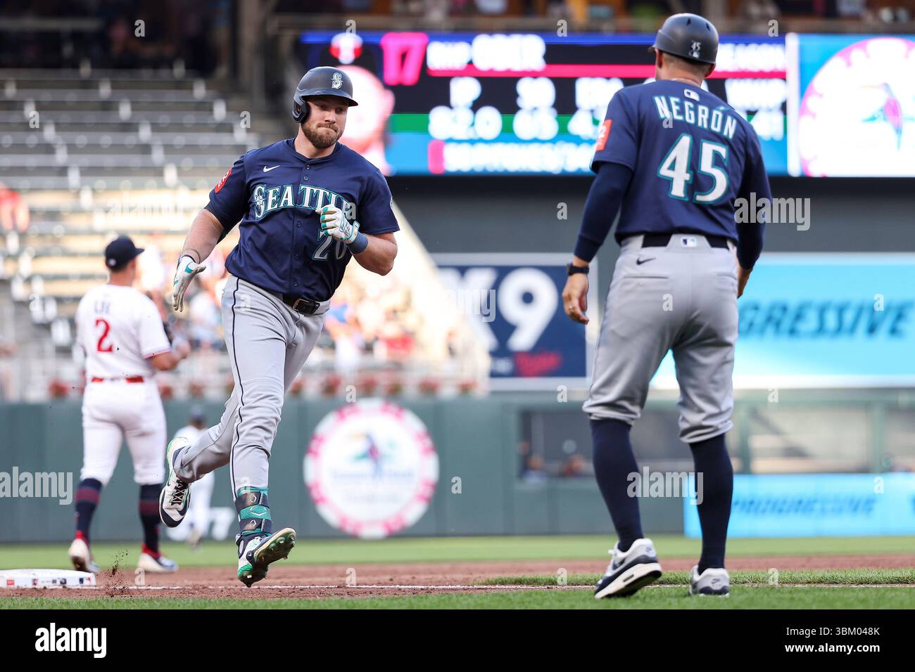 Seattle Mariners' Luke Raley (20) celebrates his three run home run as ...