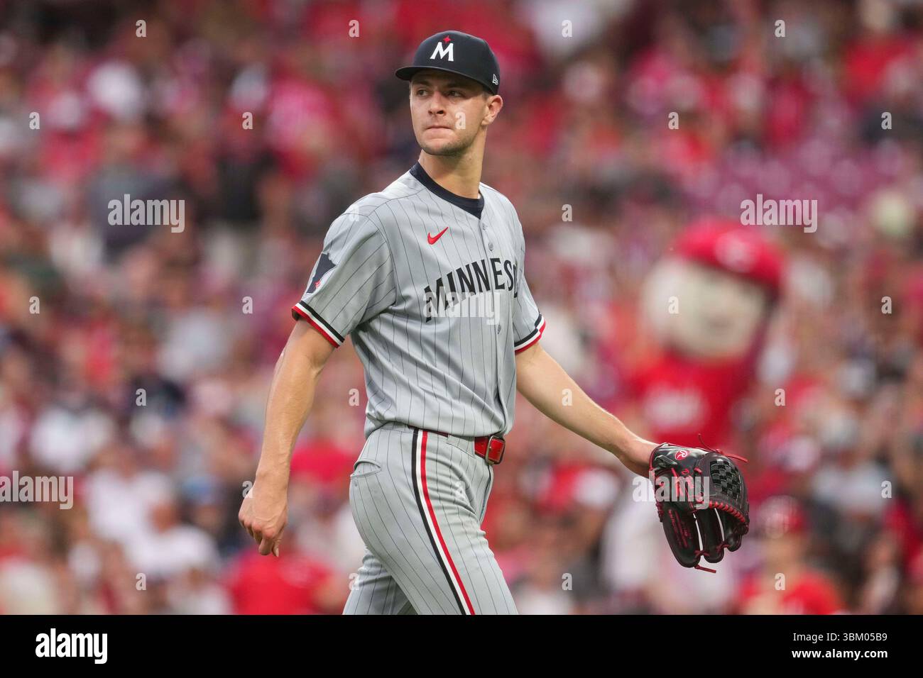 Minnesota Twins pitcher David Festa walks to the dugout during the ...