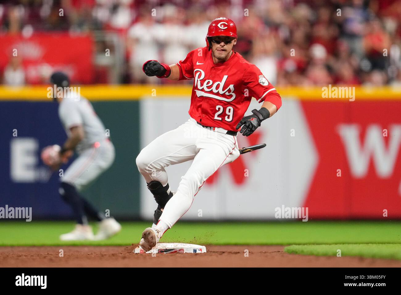 Cincinnati Reds' TJ Friedl (29) hits a double during a baseball game ...