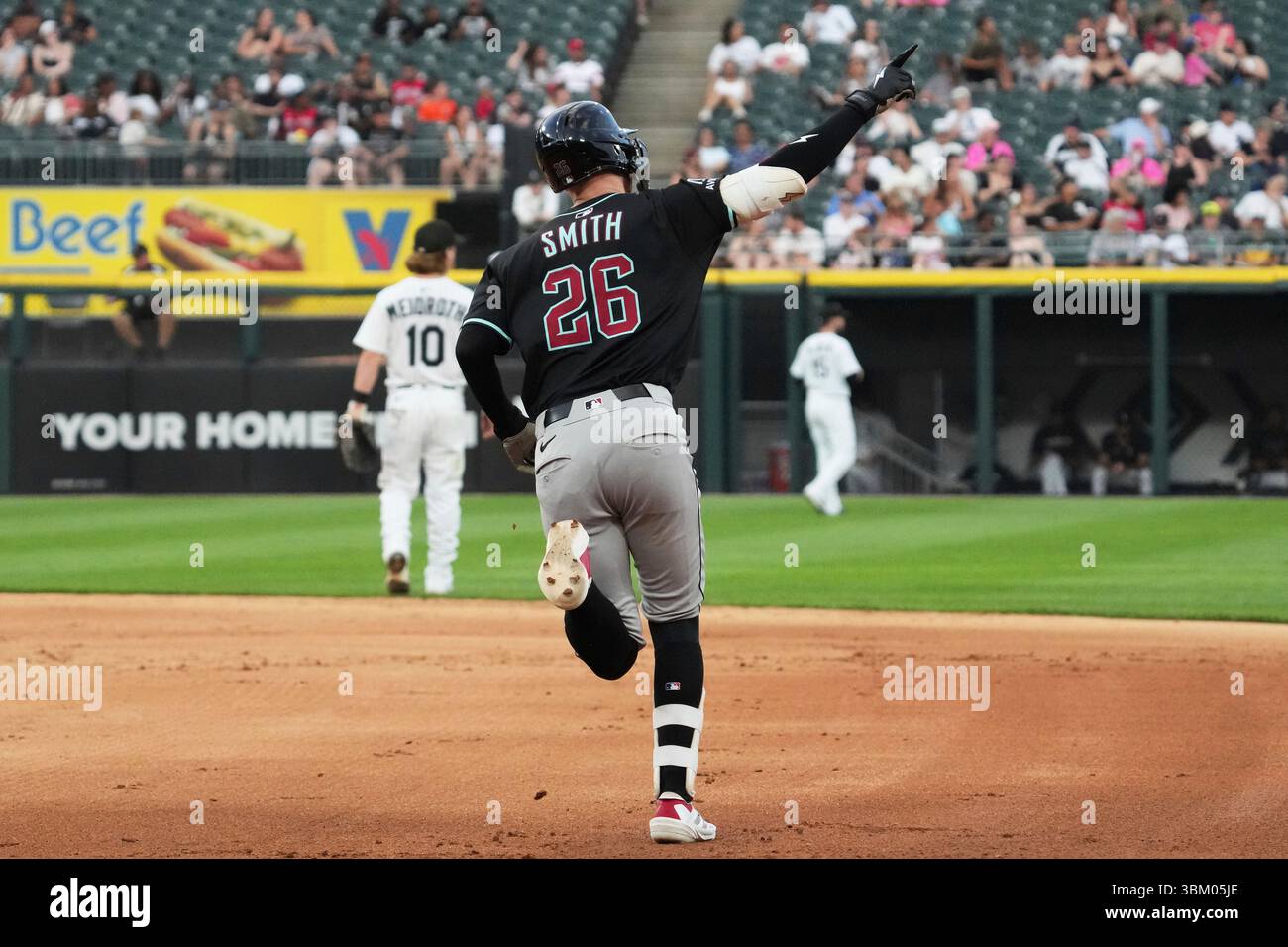 Arizona Diamondbacks' Pavin Smith (26) celebrates as he rounds the ...
