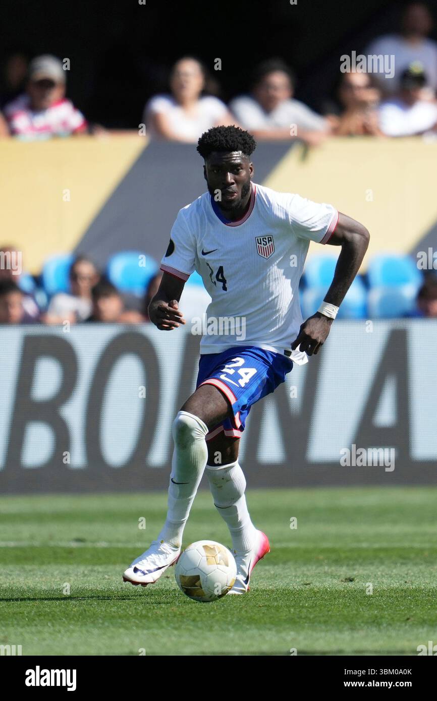 United States forward Patrick Agyemang (24) brings the ball up the ...