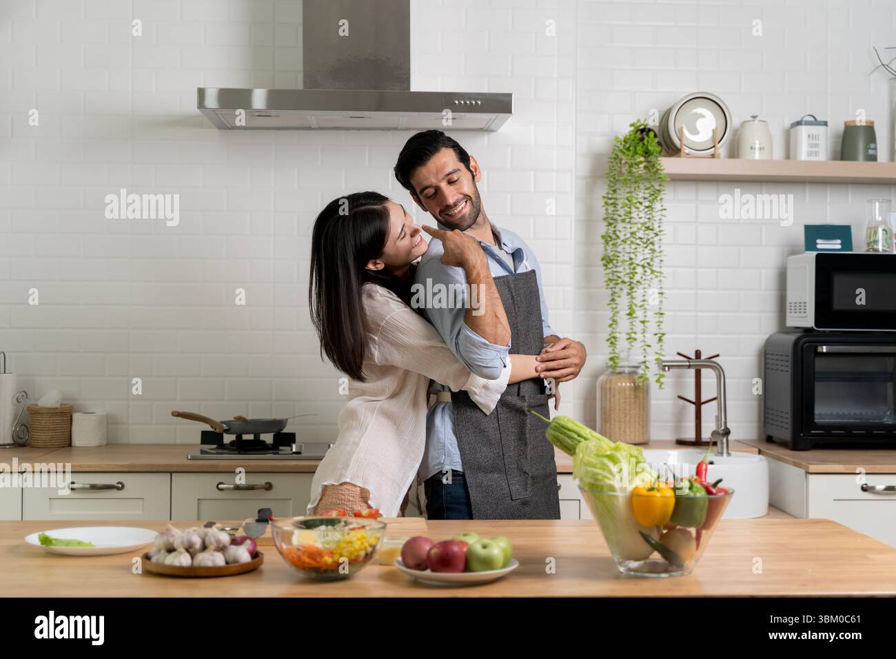 Young man touches face woman hi-res stock photography and images - Alamy