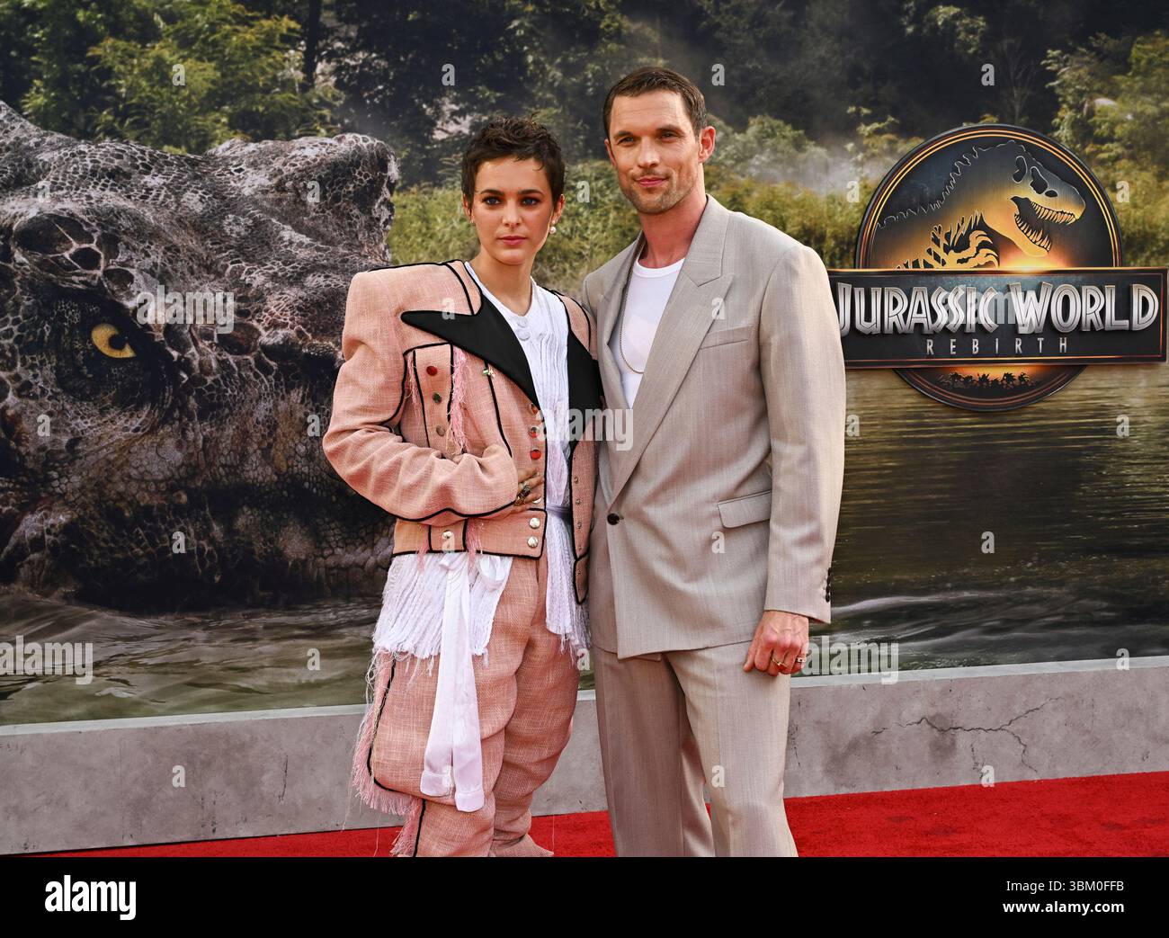 Philippine Velge, left, and Ed Skrein attend the "Jurassic World ...
