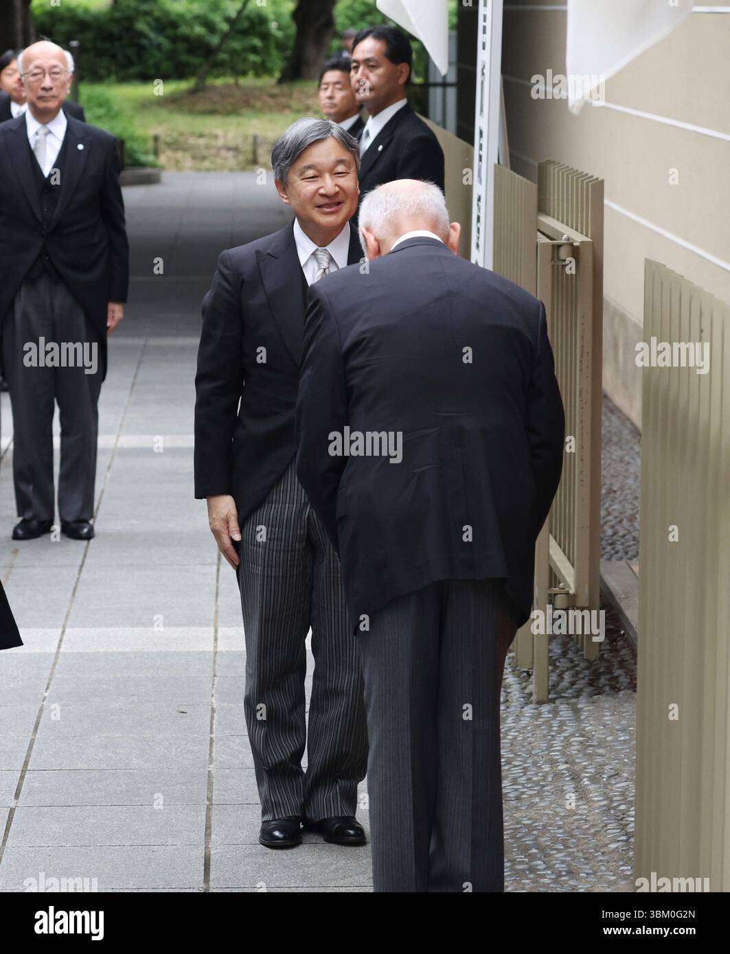 Japanese Emperor Naruhito arrives at a venue for an award ceremony of ...