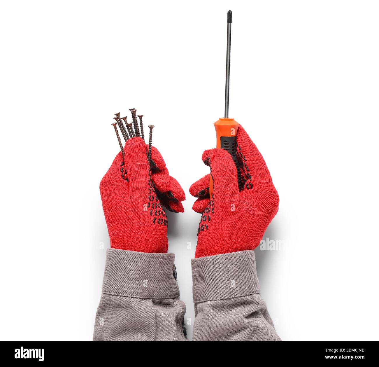 Worker's hands holding screwdriver and screw on white background Stock ...