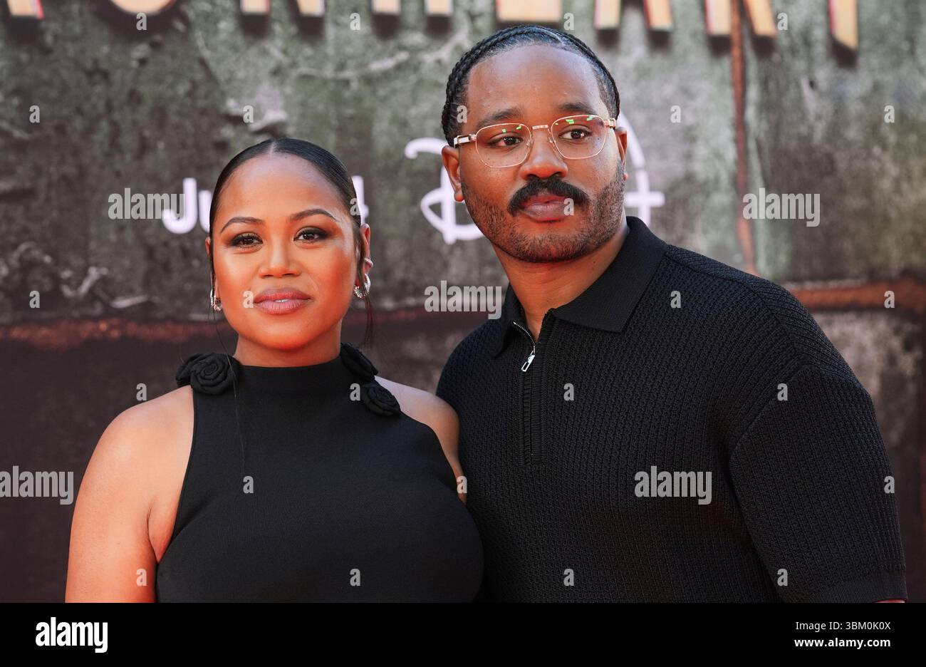 Ryan Coogler, right, and his wife Zinzi pose together at the premiere ...