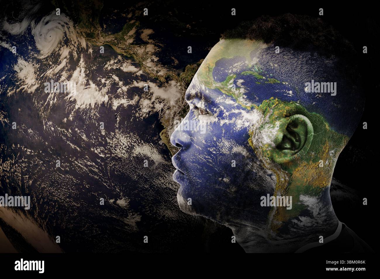 Profile of male head in digital composite over space void merging Earth ...