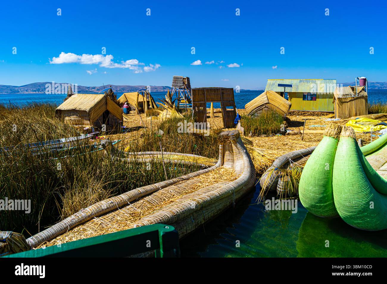Totora houses on the floating islands of the Uros, Lake Titicaca, Puno ...