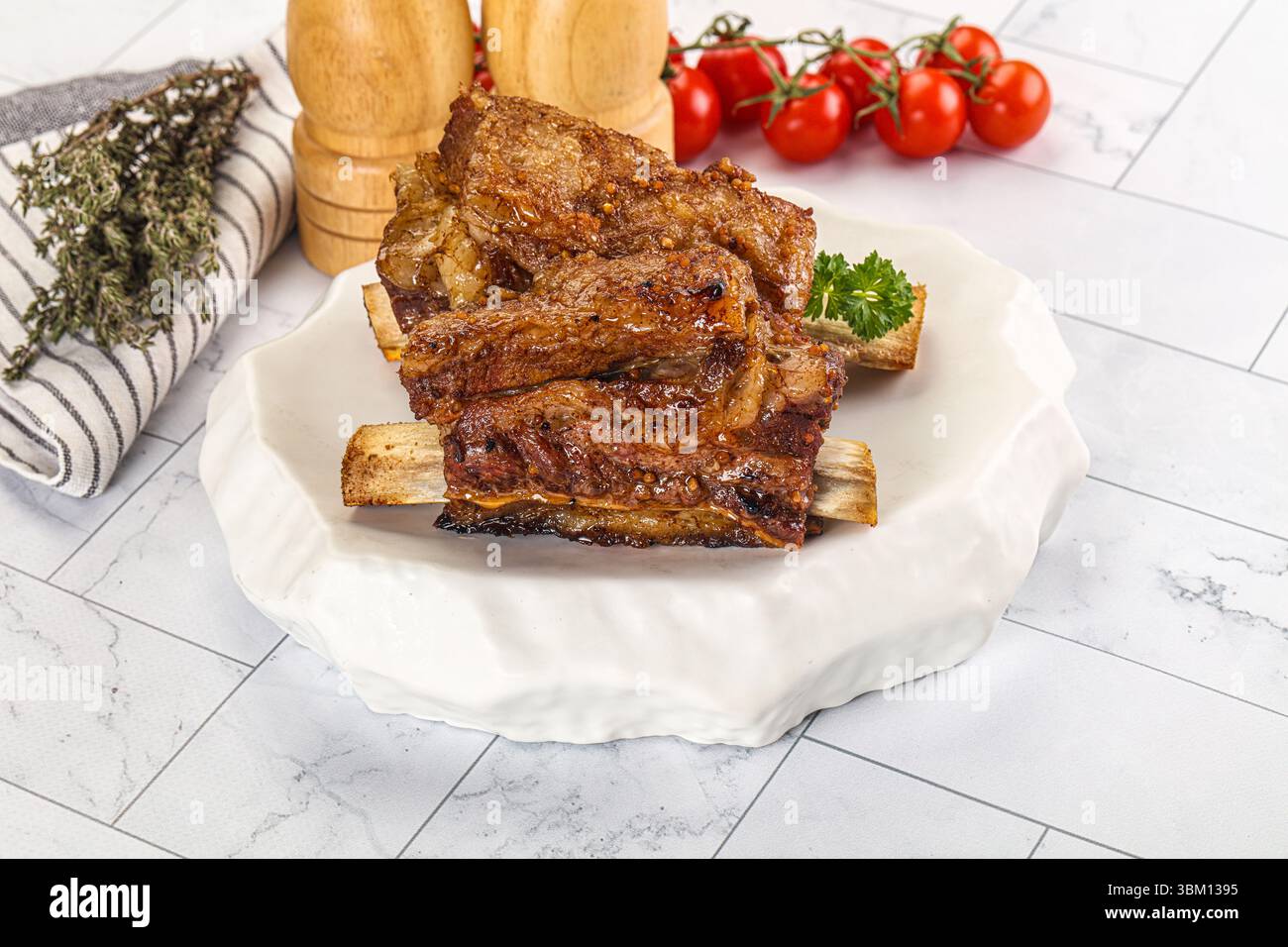 Baked beef ribs with marinade with seasoning Stock Photo - Alamy
