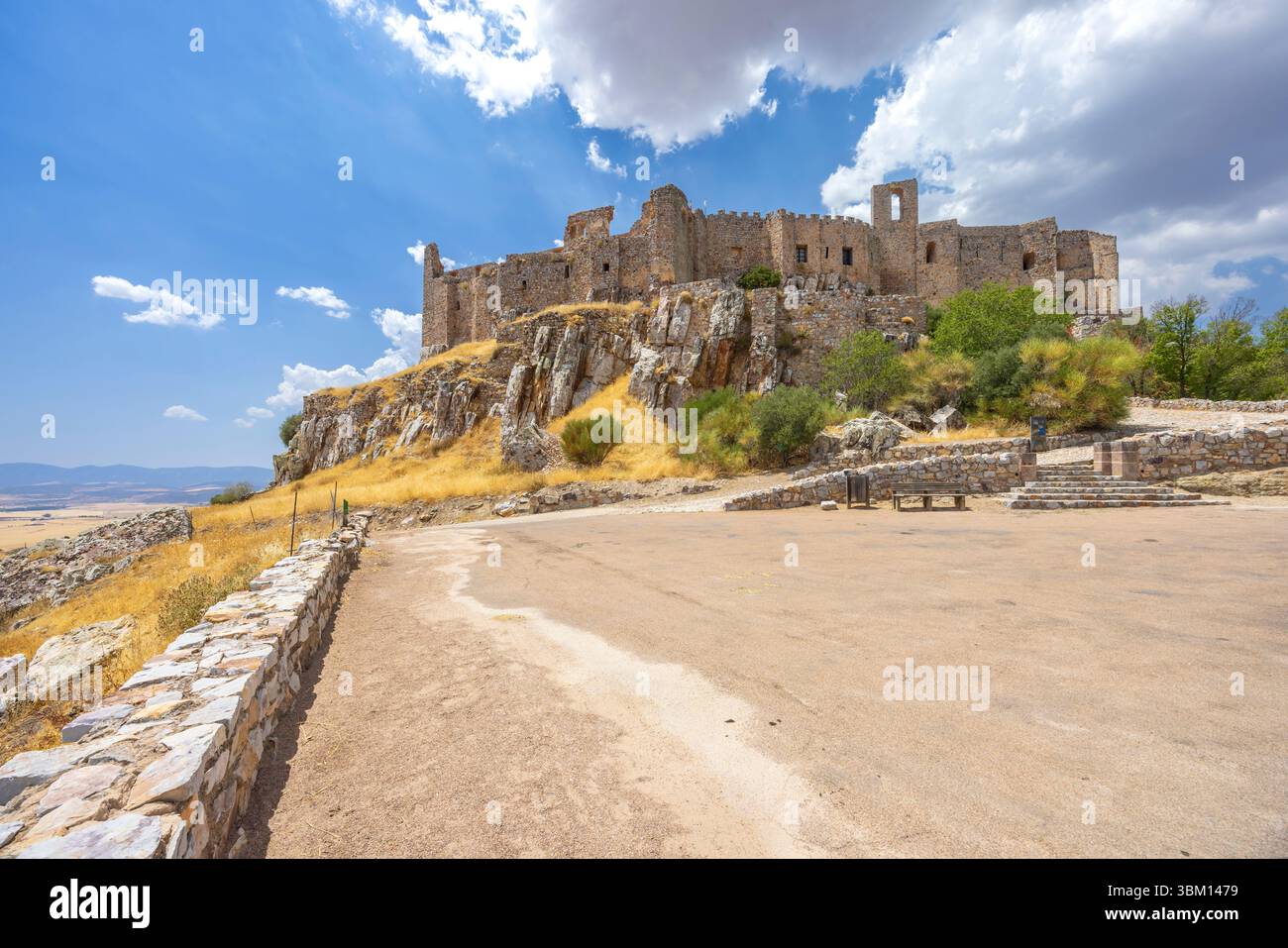 Calatrava la Nueva Castle, a medieval fortress rising above the plains ...