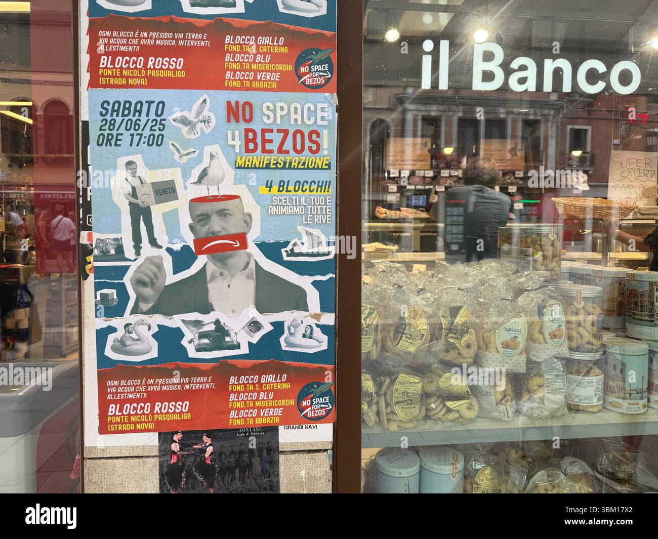 Venedig, Italy. 23rd June, 2025. A protest poster against the wedding ...