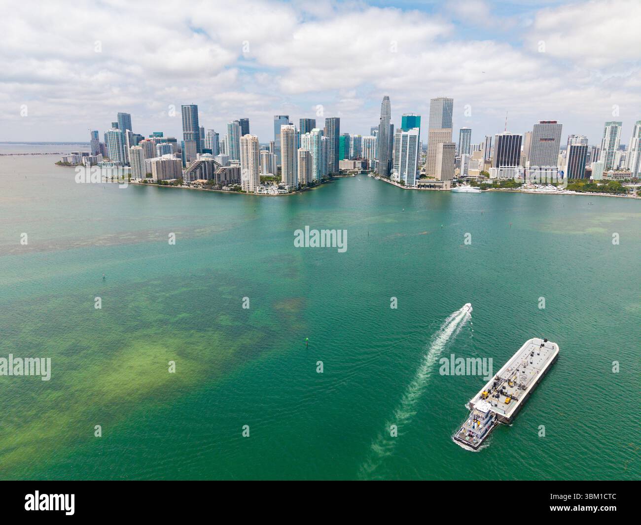 Aerial view of Brickell skyline in downtown Miami. Skyscrapers above ...